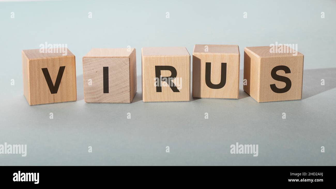 Virus - word from wooden blocks with letters on grey background Stock ...
