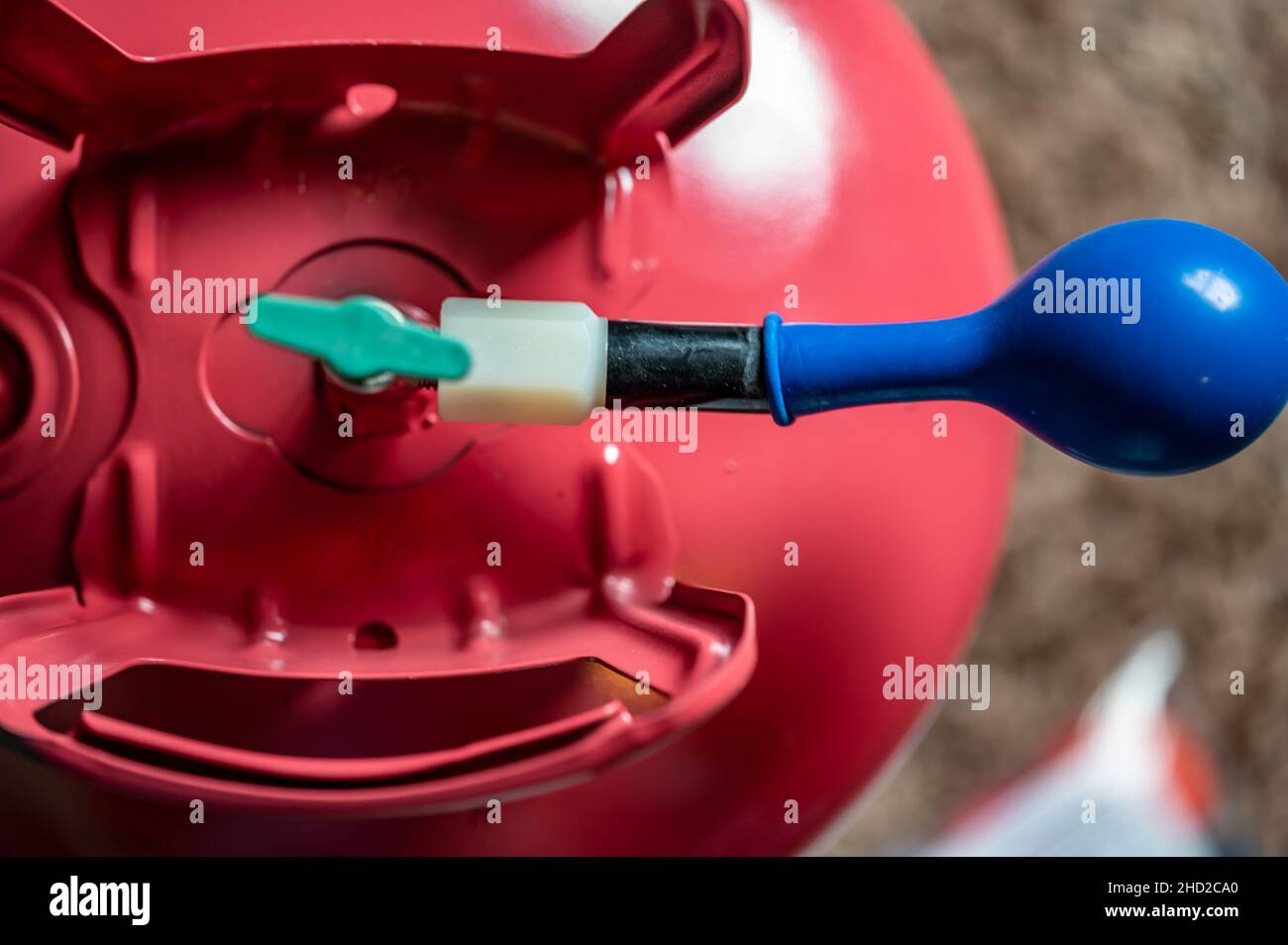 Selective focus on edge of an inflatable balloon attached to a helium ...