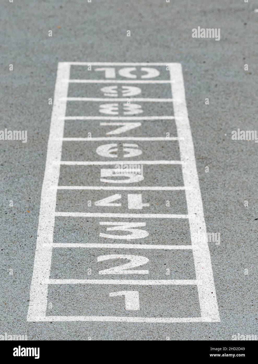 Children's hopscotch on playground. Soft gray rubbery ground, numbers ...