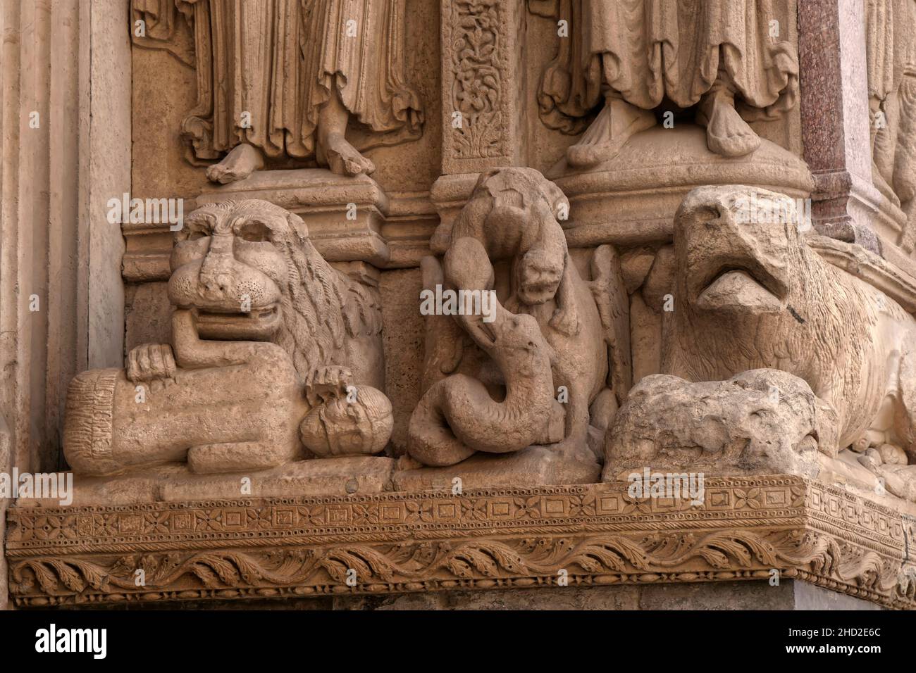grotesque stone carvings at the entrance to Saint-Trophime Primatial ...