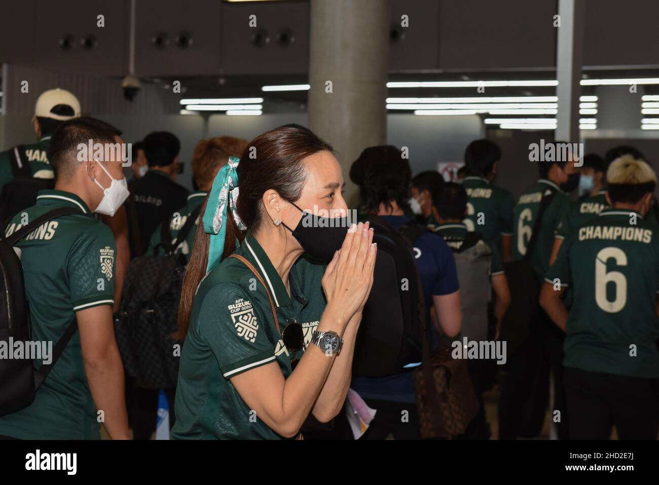 Nualphan Lamsam, also known as Madame Pang(C), the manager of the Thai ...