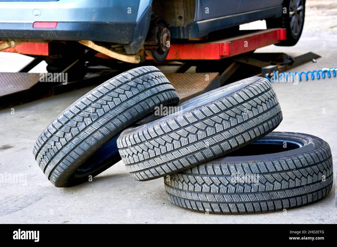 Service for the repair and replacement of a car wheel at a tire station ...