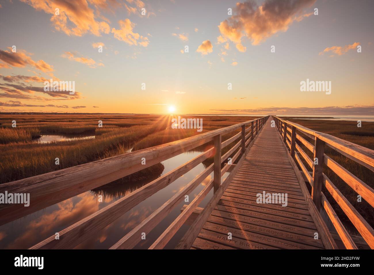 Grays beach boardwalk in cape cod during sunset Stock Photo - Alamy