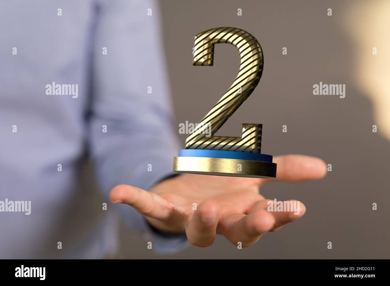 3D rendering of the 2nd award in hand Stock Photo - Alamy