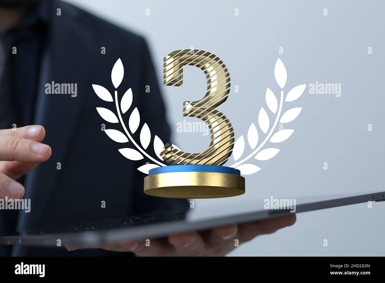 3d rendering of the third-ranked award with a design in a man's hand Stock Photo - Alamy