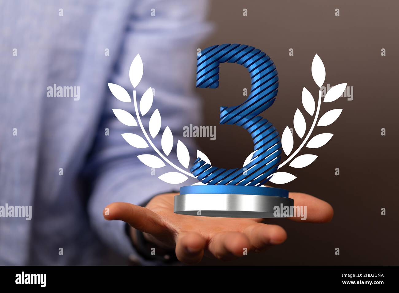 3d rendering of the third-ranked award with a design in a man's hand ...