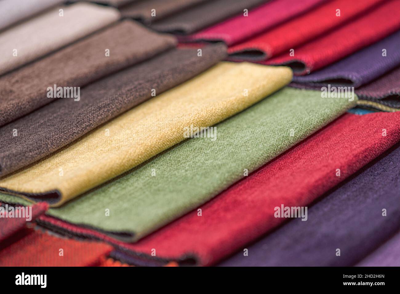Samples of textiles for upholstery. Closeup details of multicolor ...