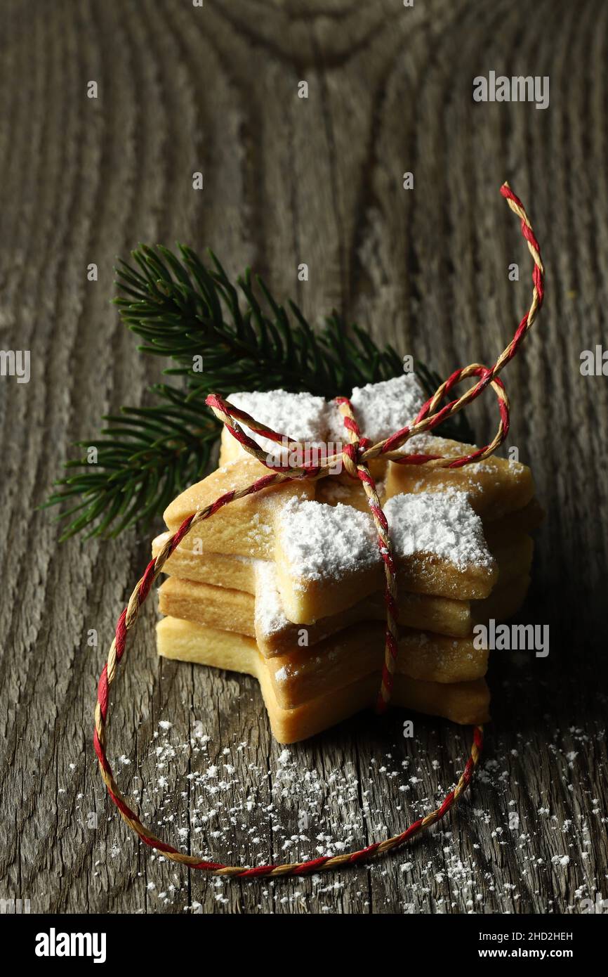 Christmas cookies. Biscuits with shortcrust pastry on wooden background ...