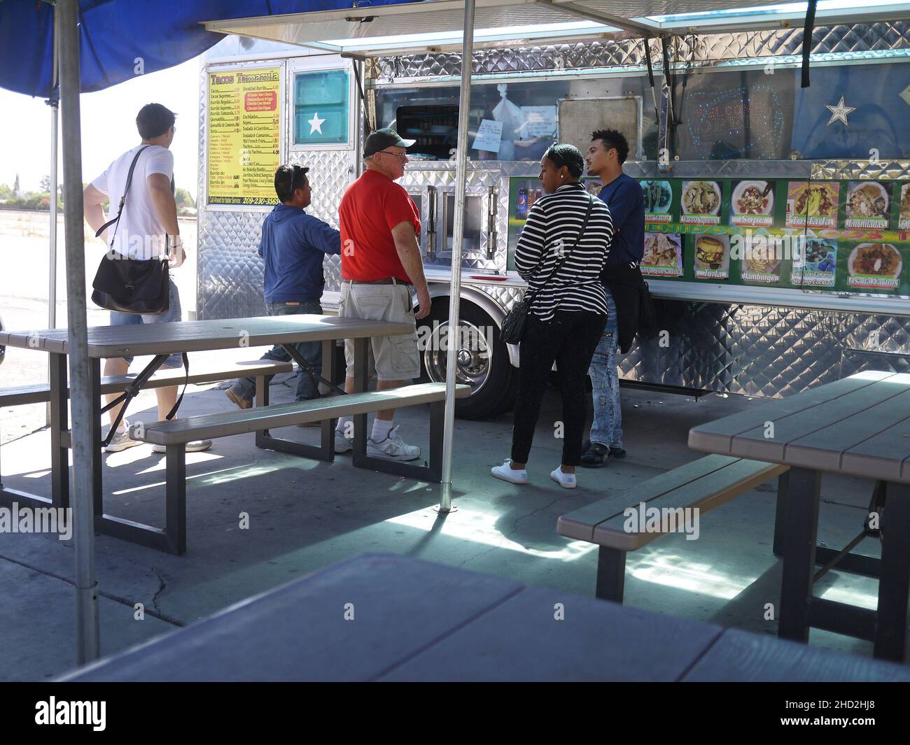 Customers at a fast food street vendor Stock Photo - Alamy