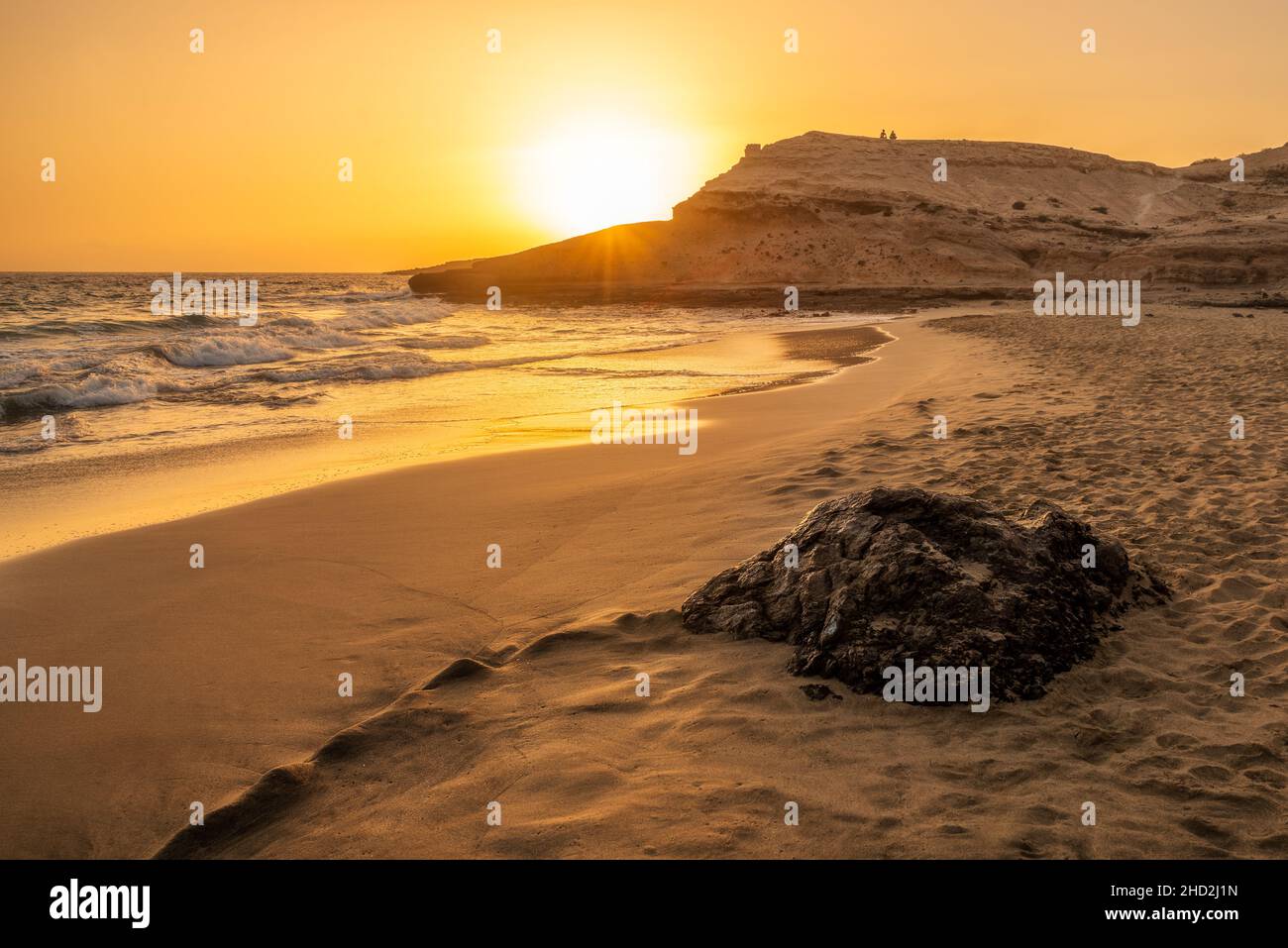 Tenerife Calima creates a beautiful sunset haze over sandy beach ...