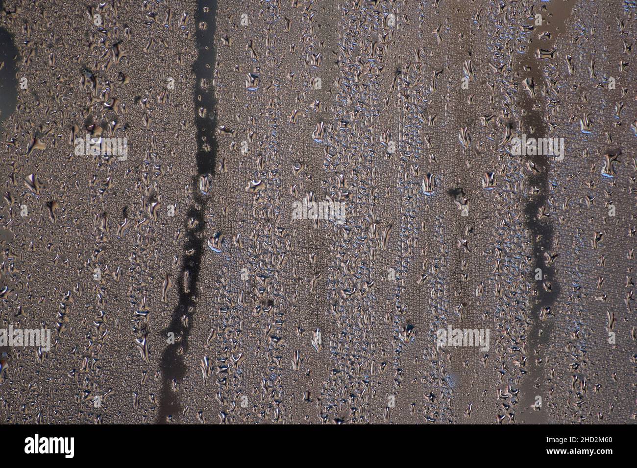 Waterdrops condensation on a glass window abstract background Stock ...