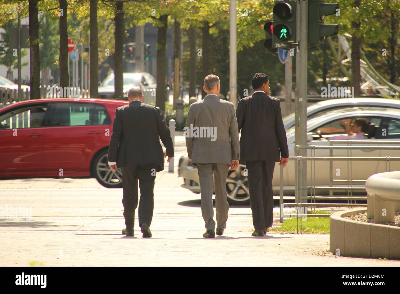 Back of gentlemen in a street Stock Photo - Alamy