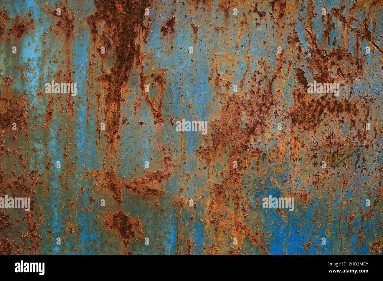 Old rusty metal sheet with blue peeling paint grunge background or ...