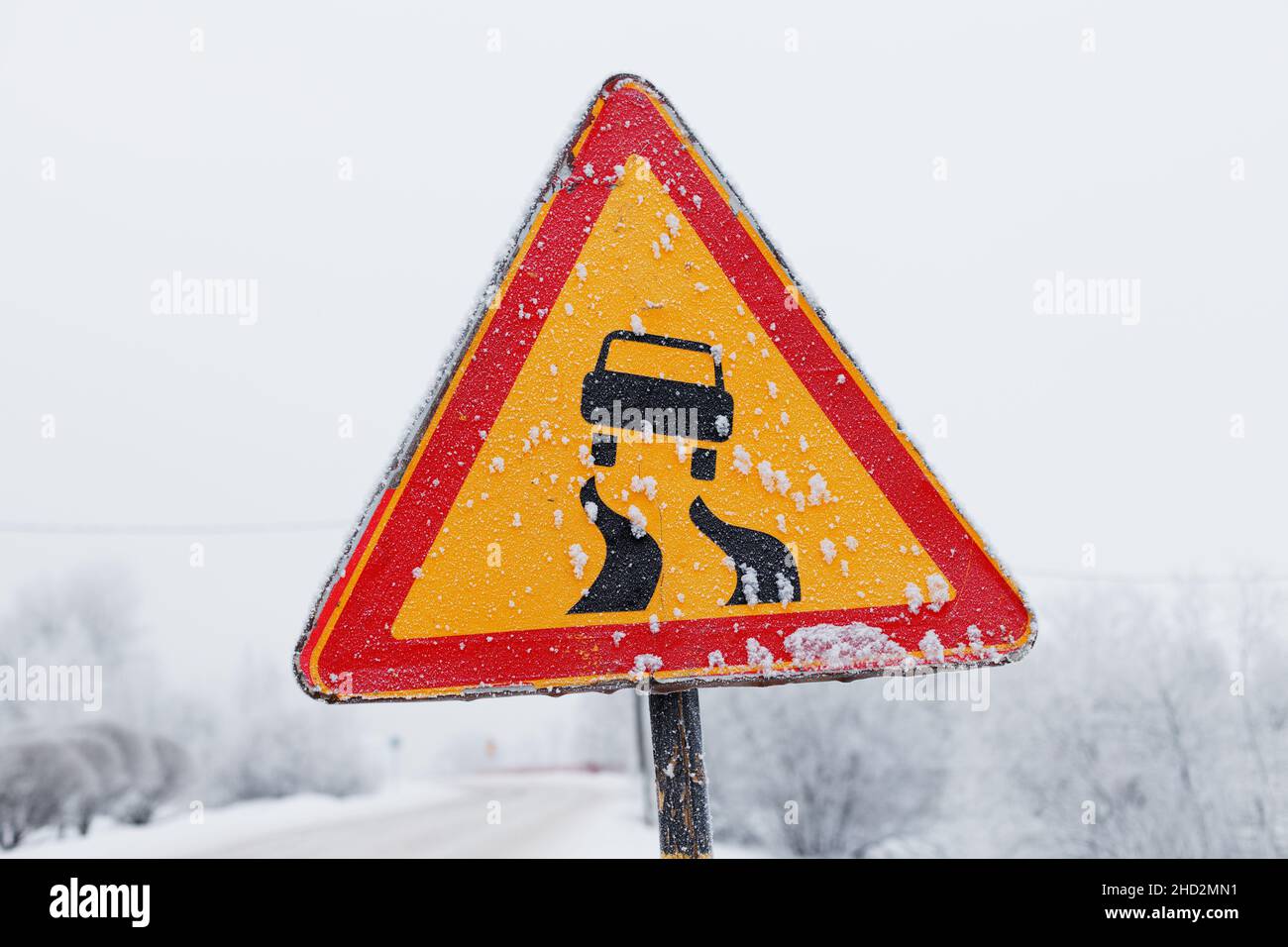road sign red triangle with a yellow field with a picture of a car and ...