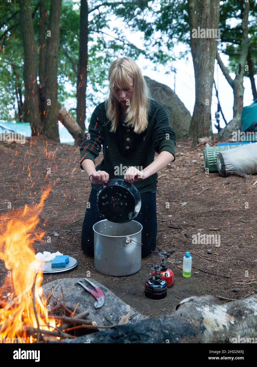 Cooking over campfire Stock Photo - Alamy