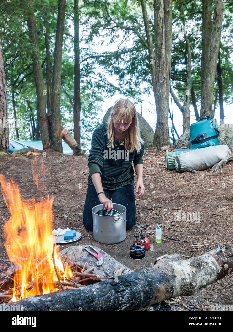 Cooking over campfire Stock Photo - Alamy