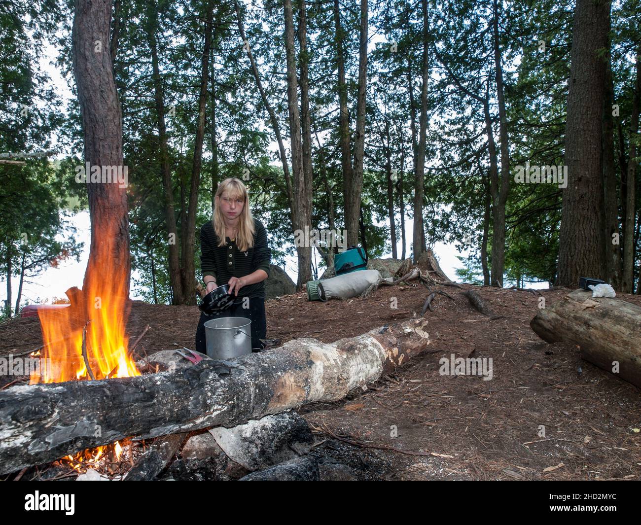 Cooking over campfire Stock Photo - Alamy
