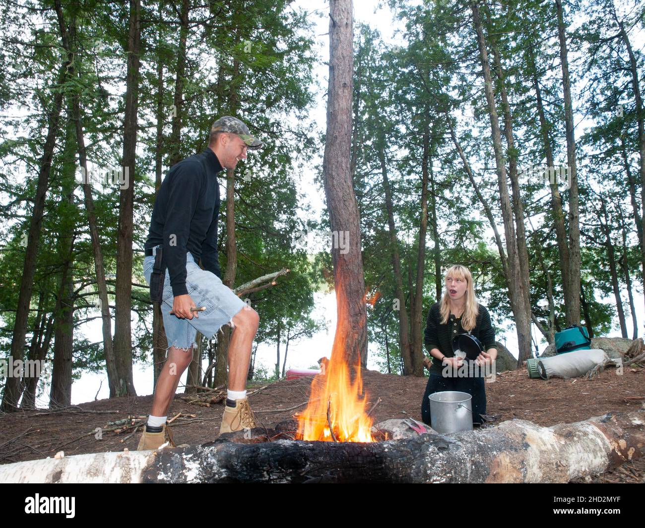 Cooking over campfire Stock Photo - Alamy