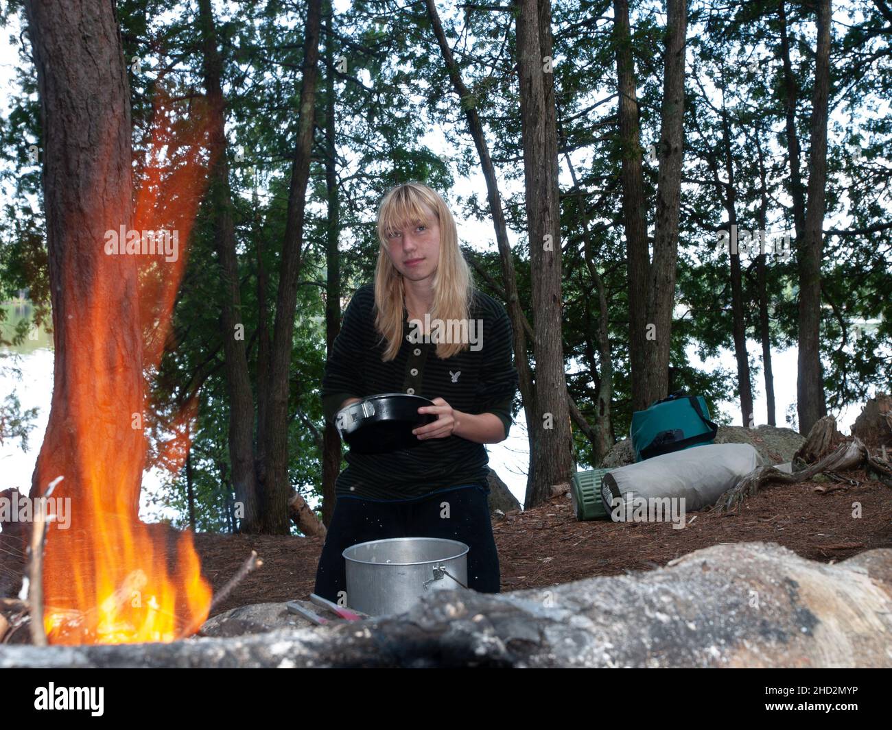 Cooking over campfire Stock Photo - Alamy
