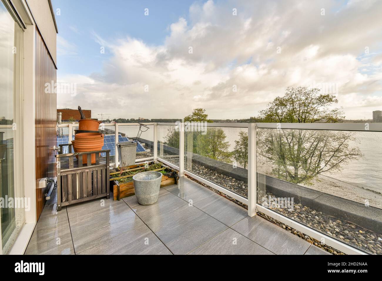 Balcony of a beautiful house in the daytime Stock Photo - Alamy