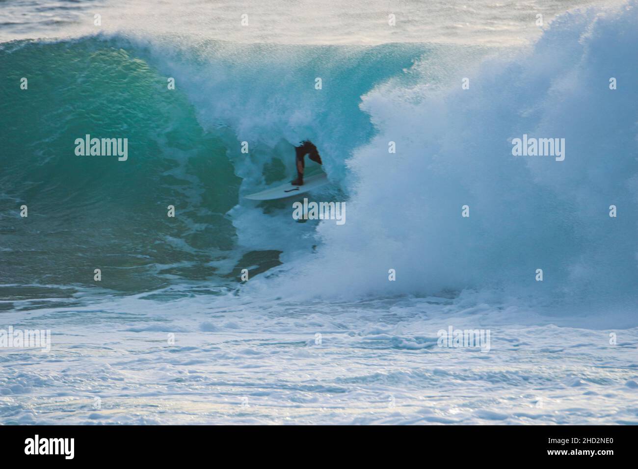 Surfer in a perfect barrel wave Stock Photo - Alamy