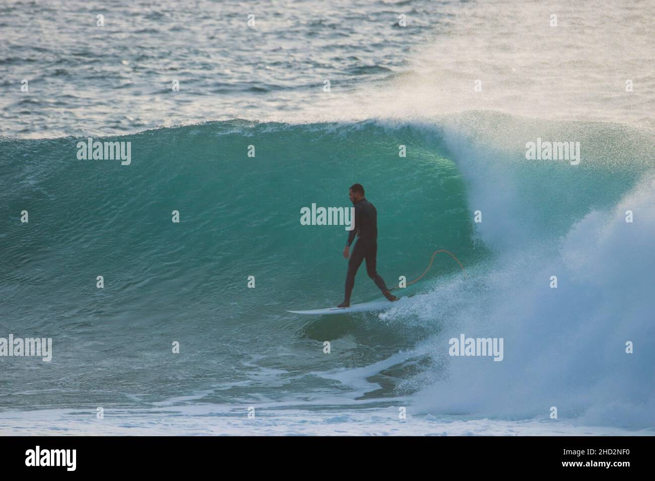 Surfer in a perfect barrel wave Stock Photo - Alamy