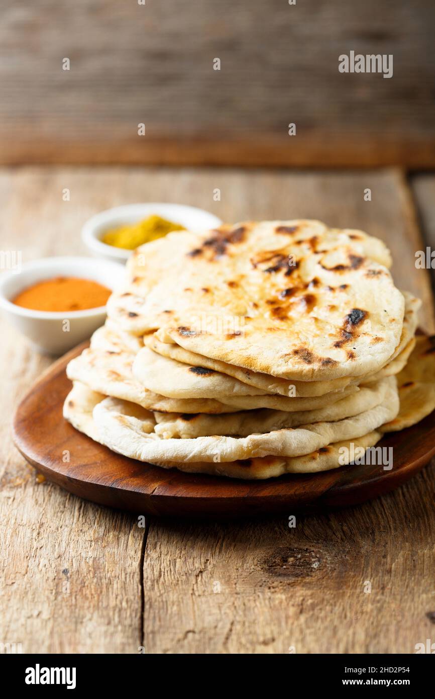 Traditional homemade flatbread on desk Stock Photo - Alamy