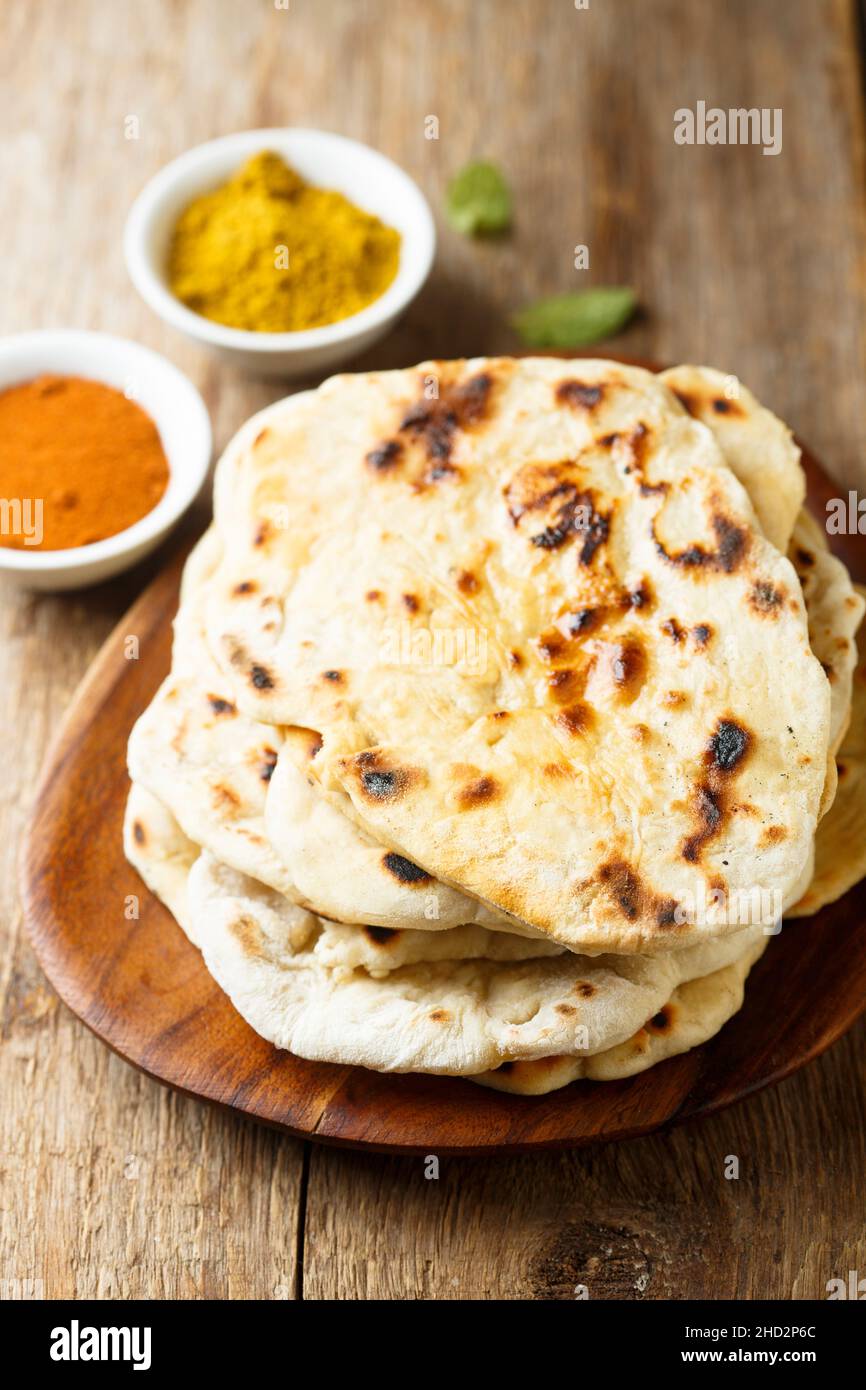 Traditional homemade flatbread on desk Stock Photo - Alamy