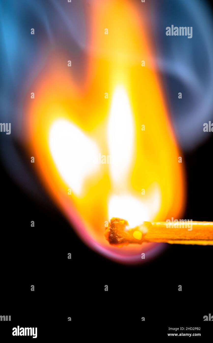 Fire on a match Stock Photo - Alamy