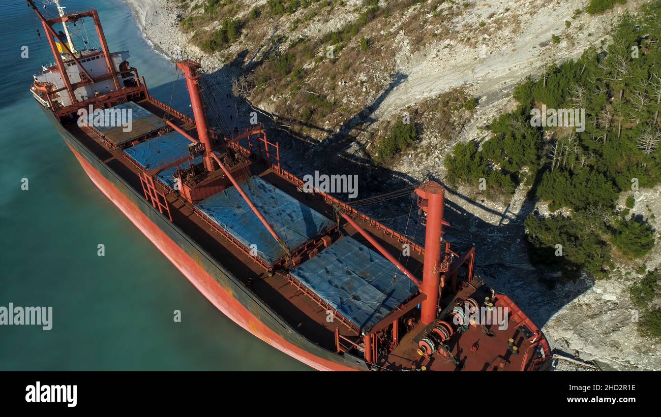 Aerial view of the ship washed ashore. Shot. Top view of an abandoned ...