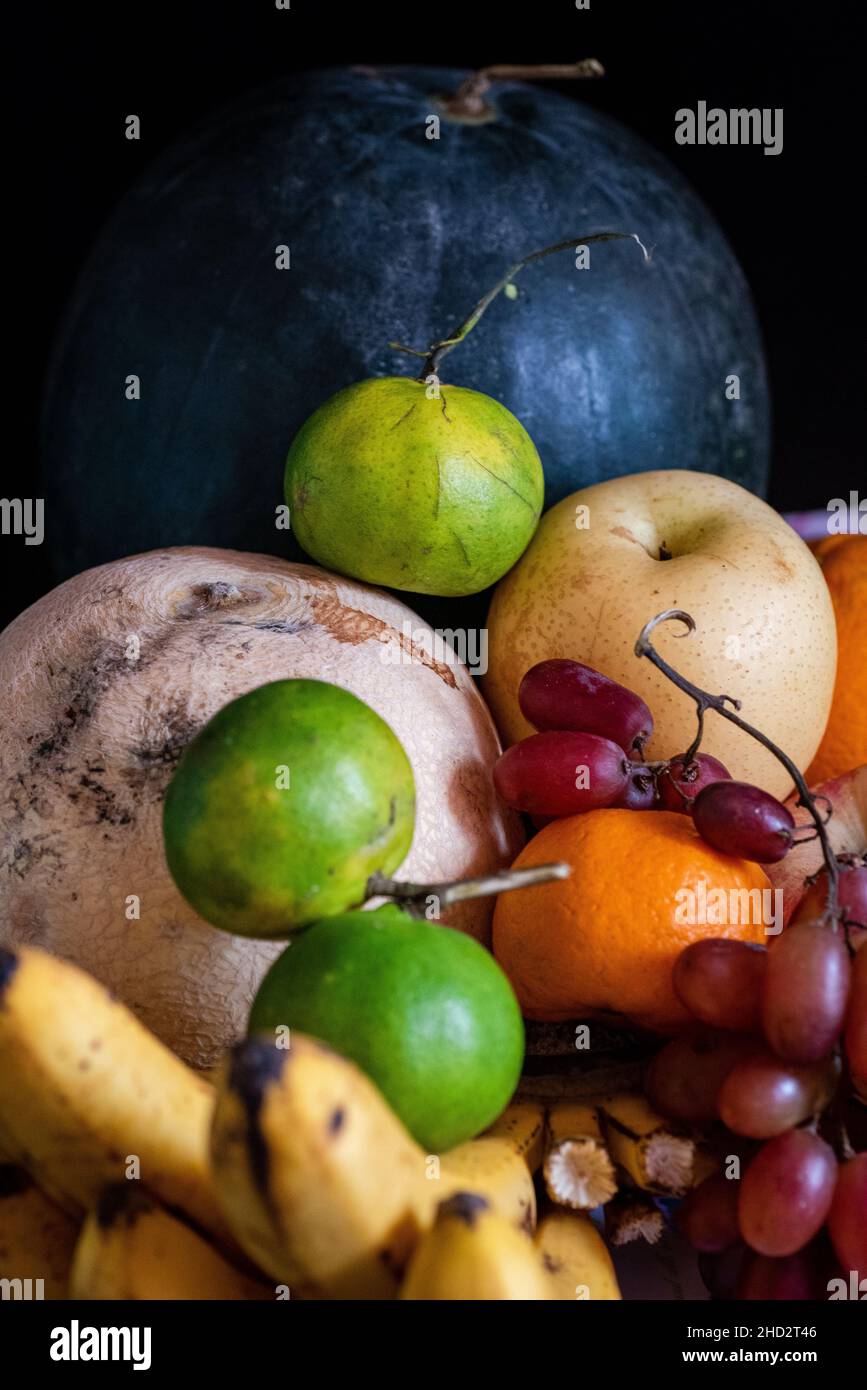 Assorted tropical fruits to welcome the new year Stock Photo - Alamy
