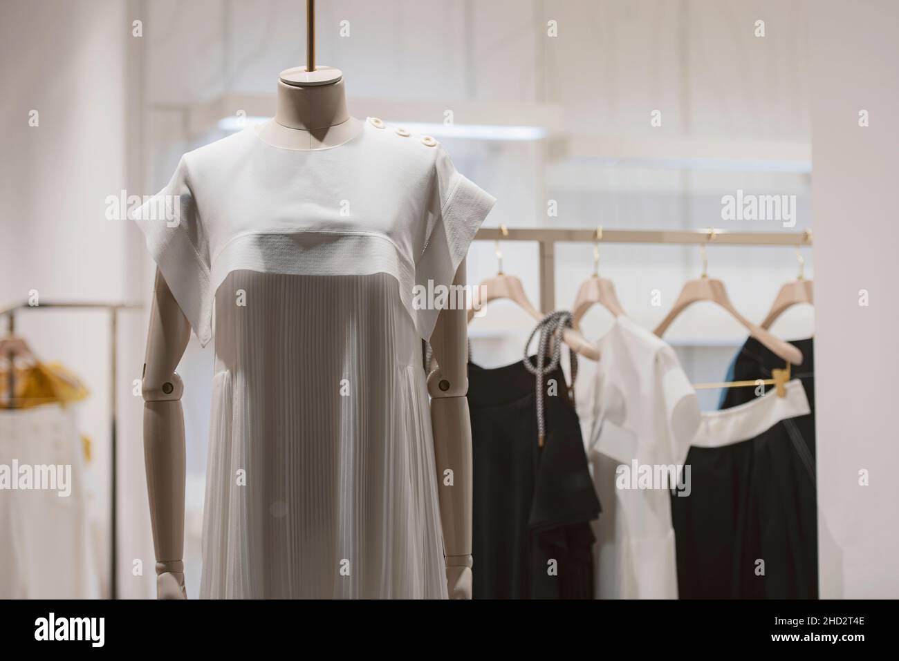 shopping concept - colorful clothing in a fancy store Stock Photo - Alamy
