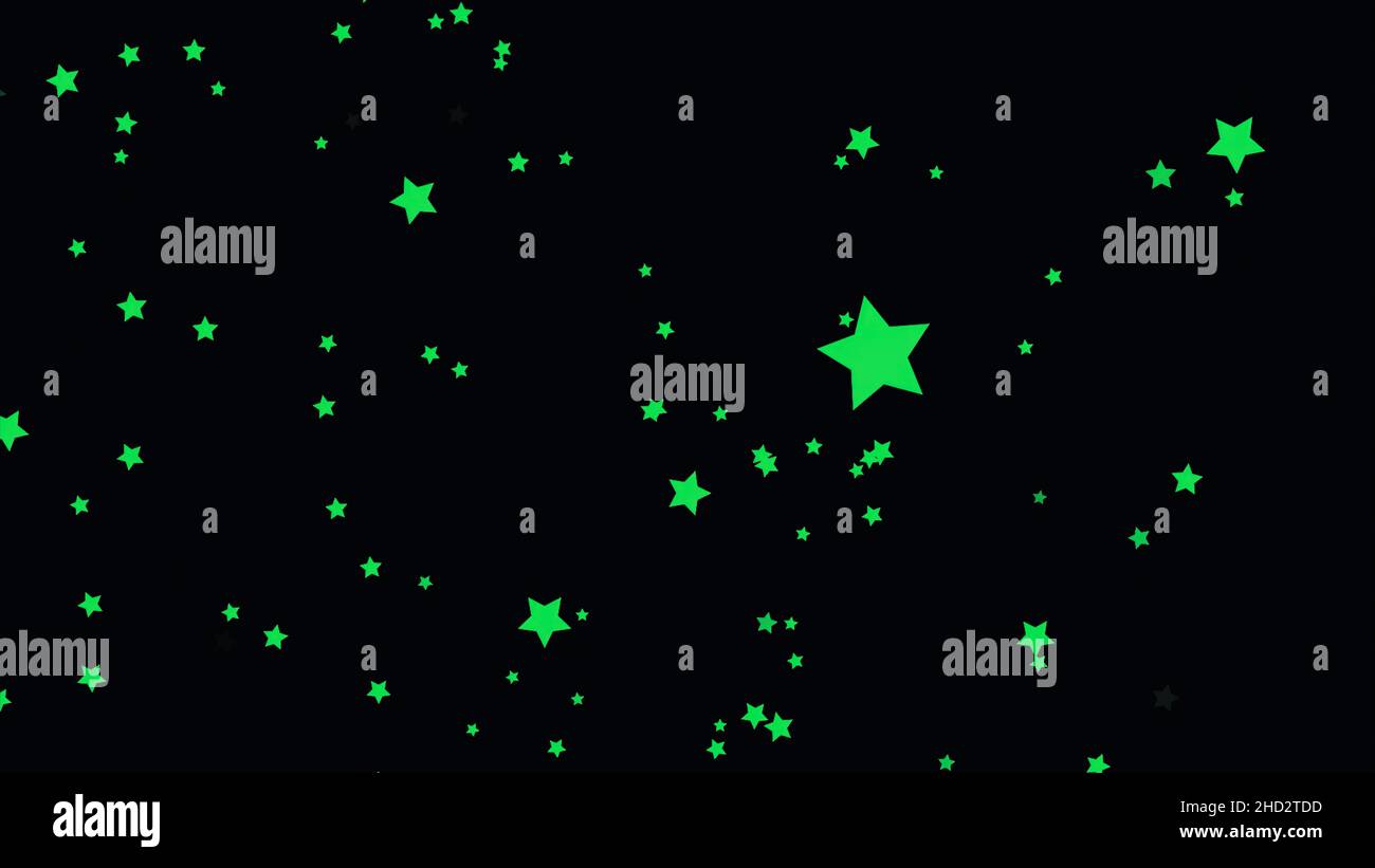 Beautiful, green shooting stars from bottom to top on black background ...