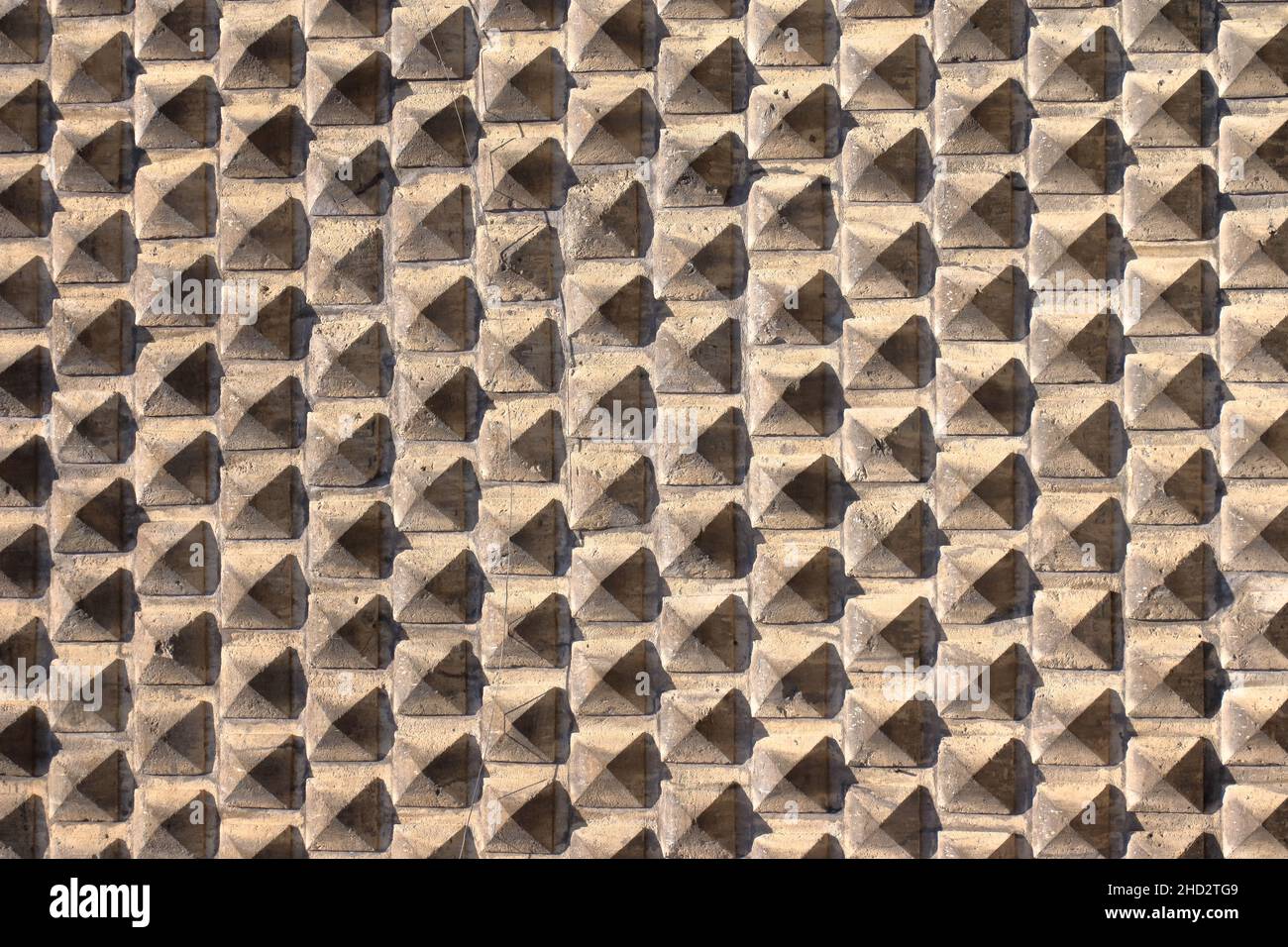 old grey concrete wall, pyramid, pyramidal shape Stock Photo - Alamy