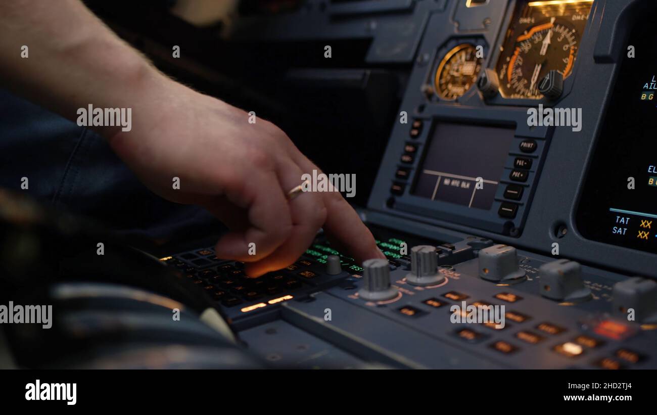 Panel of switches on an aircraft flight deck. Autopilot control element ...