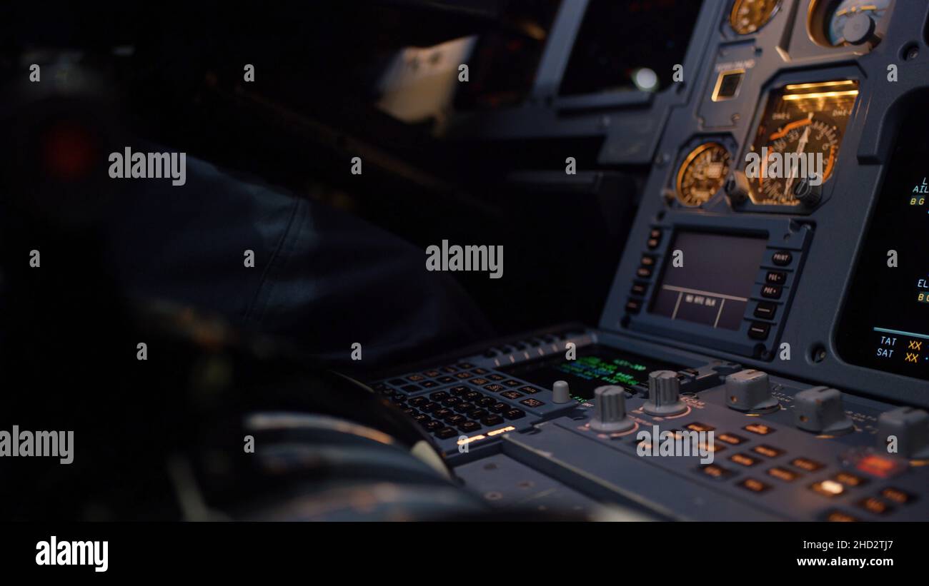 Panel of switches on an aircraft flight deck. Autopilot control element ...