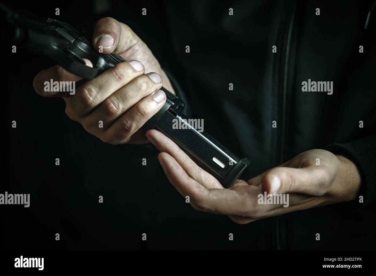 Man reloading gun hi-res stock photography and images - Alamy