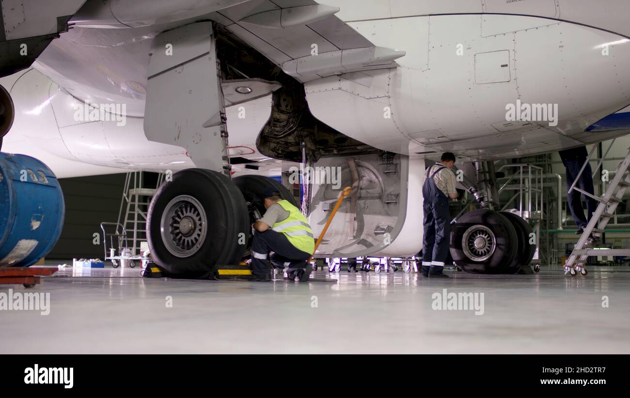 Inspection and preparing the aircraft before take off. Maintenance of ...