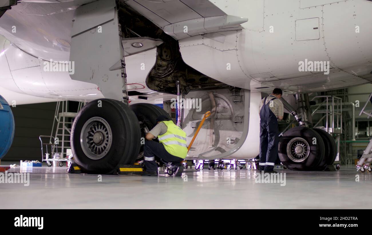 Inspection and preparing the aircraft before take off. Maintenance of ...