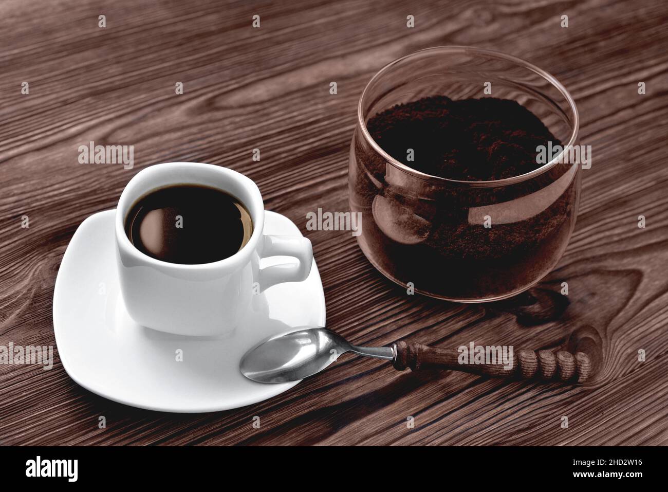 coffee in a cup on a stone stand ground coffee in a glass jar vintage ...