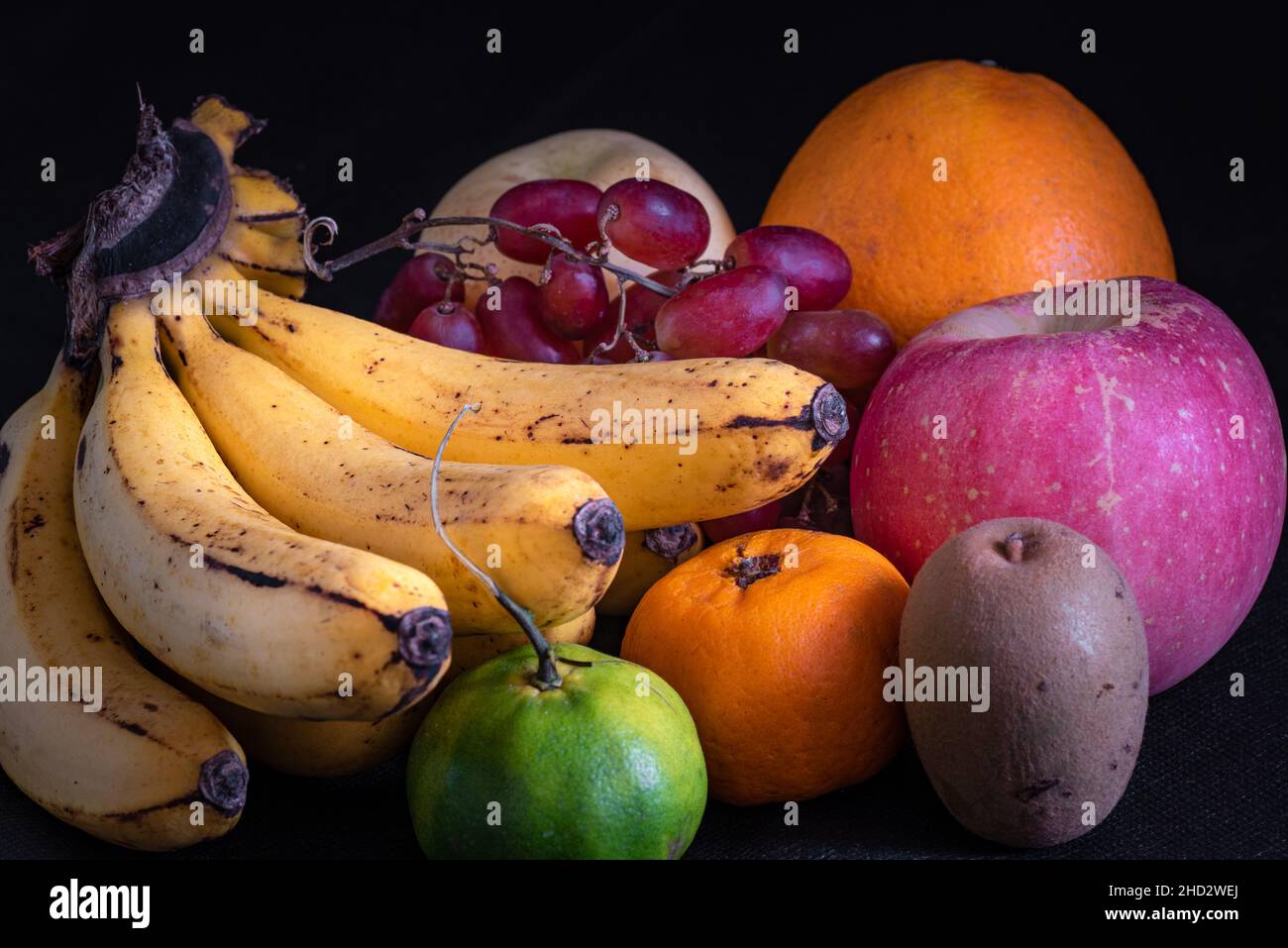 Assorted tropical fruits to welcome the new year Stock Photo - Alamy