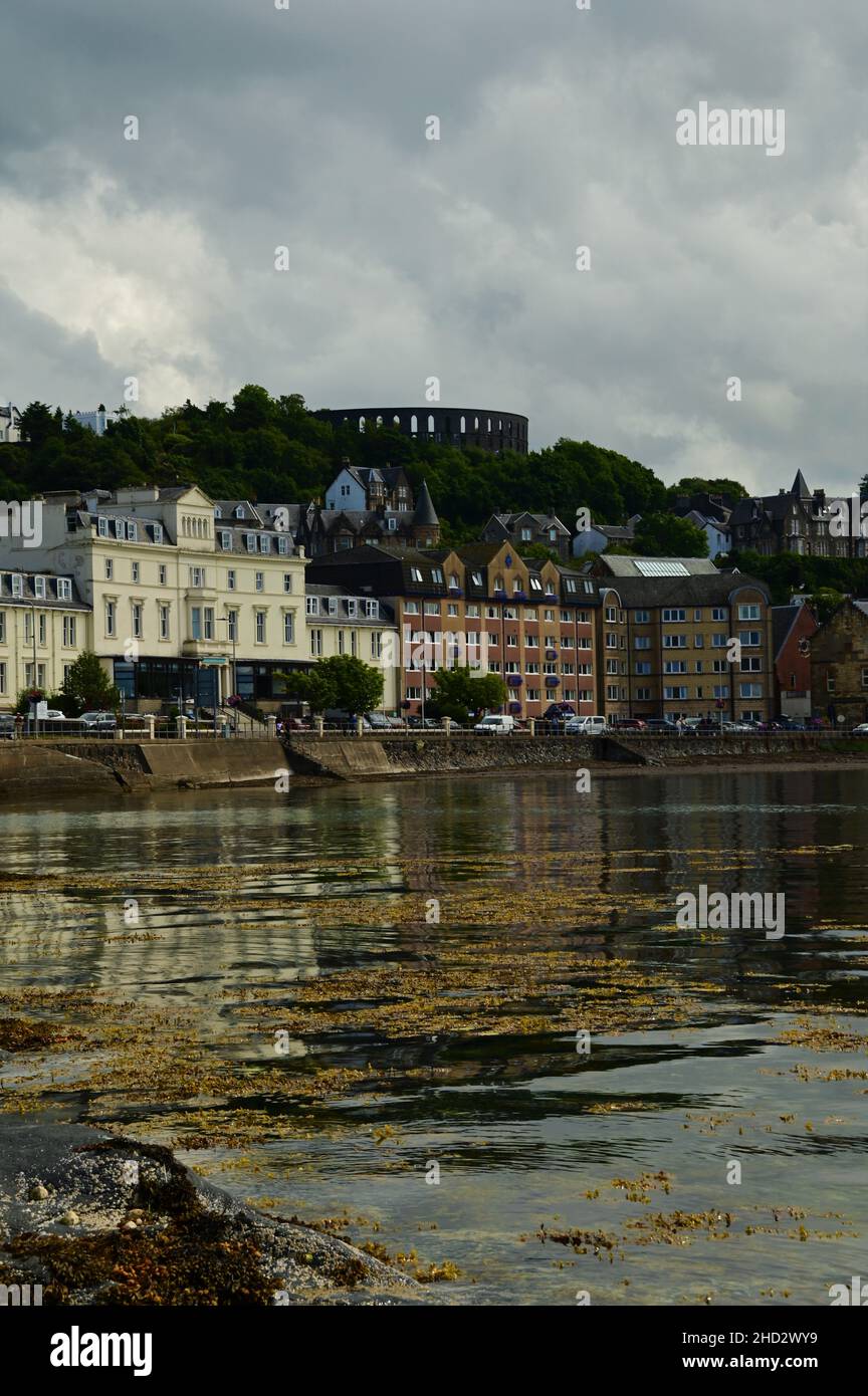 A view along the waterfront of the west highland coastal town of Oban ...