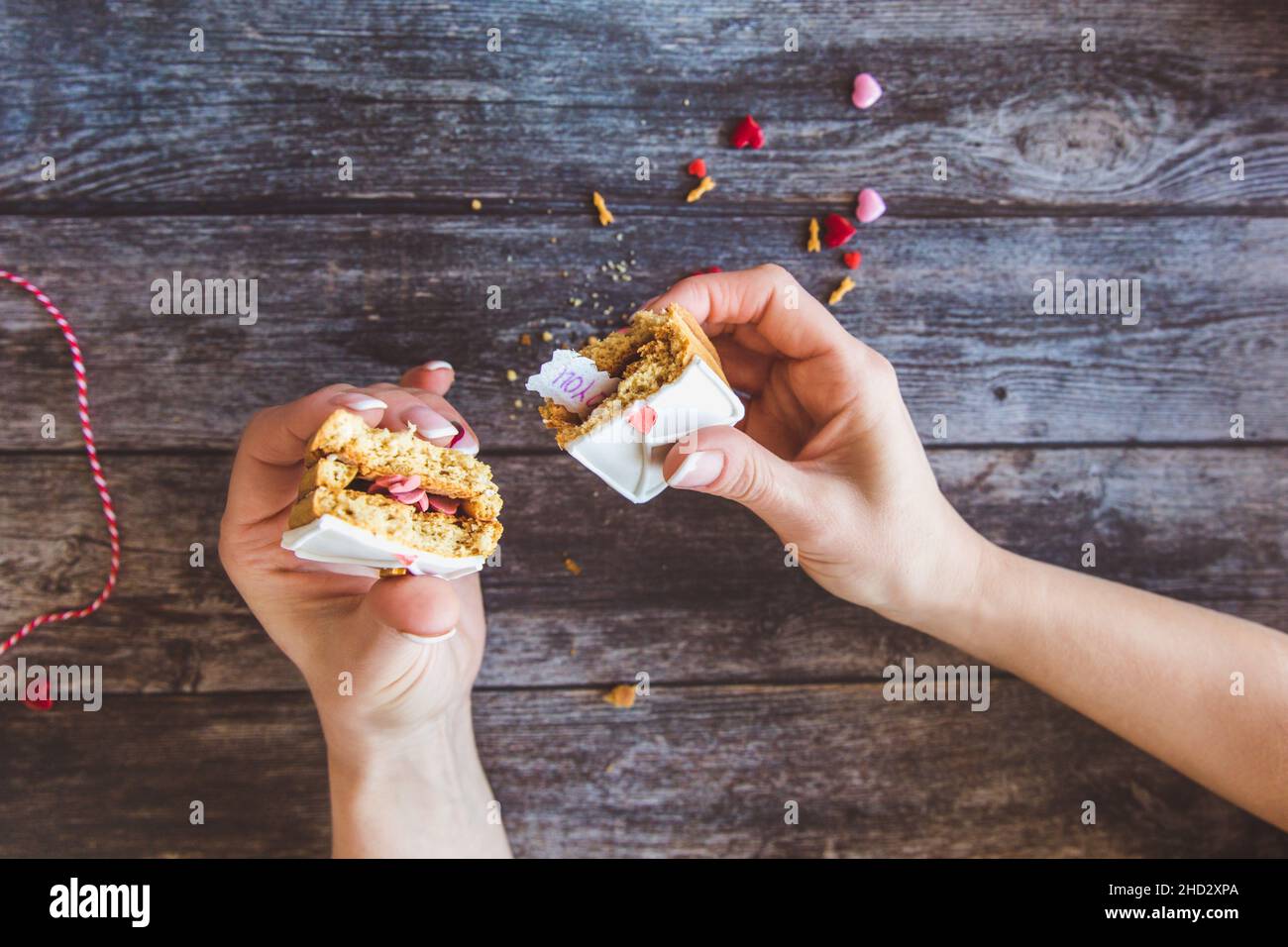 Baking Surprise Cookies with topping and icing on wooden background ...