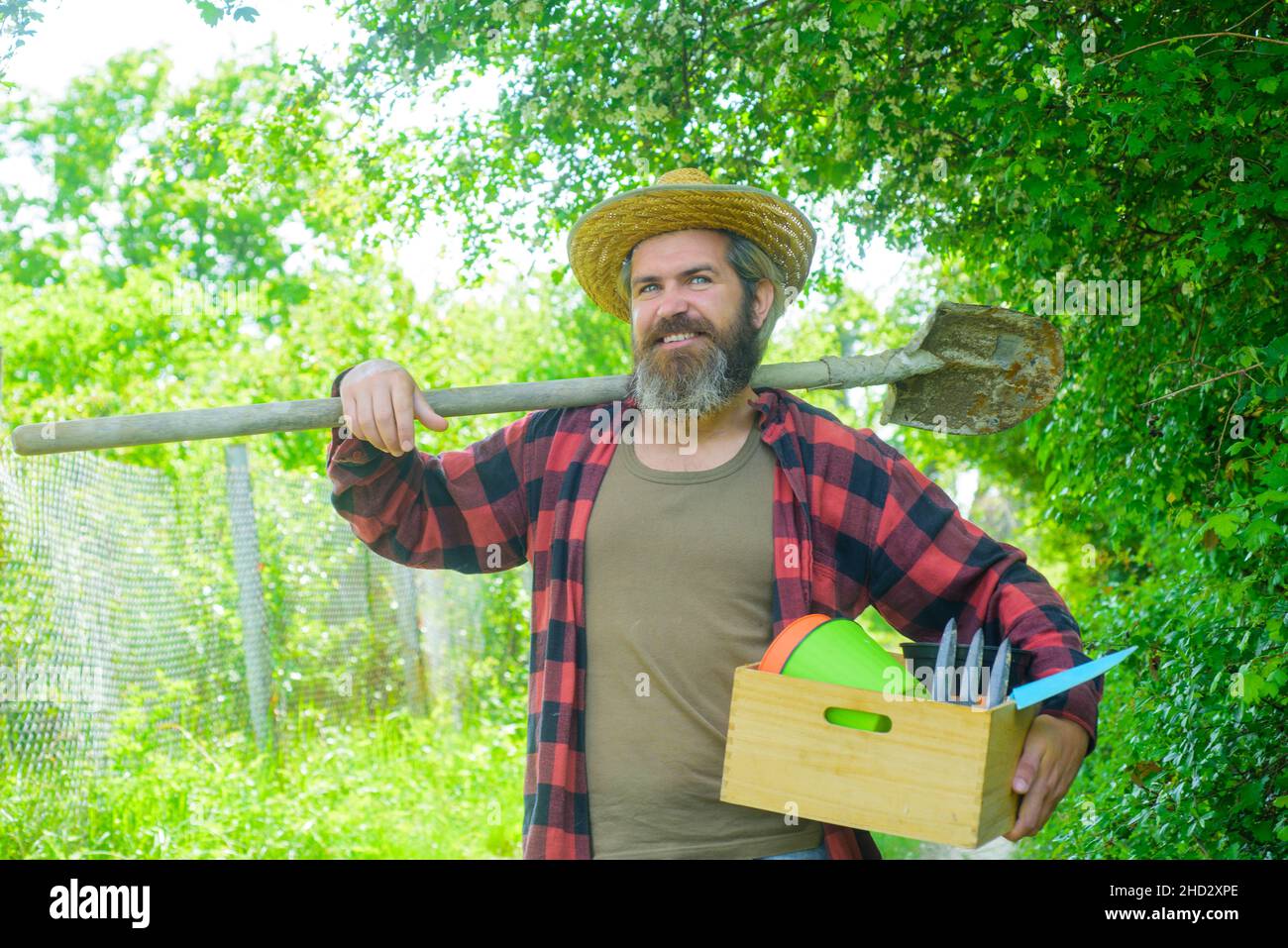 Attractive male gardener hi-res stock photography and images - Alamy