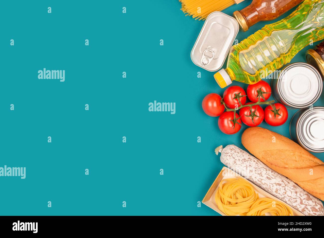 Food bank, food delivery concept. Food donations on green background ...