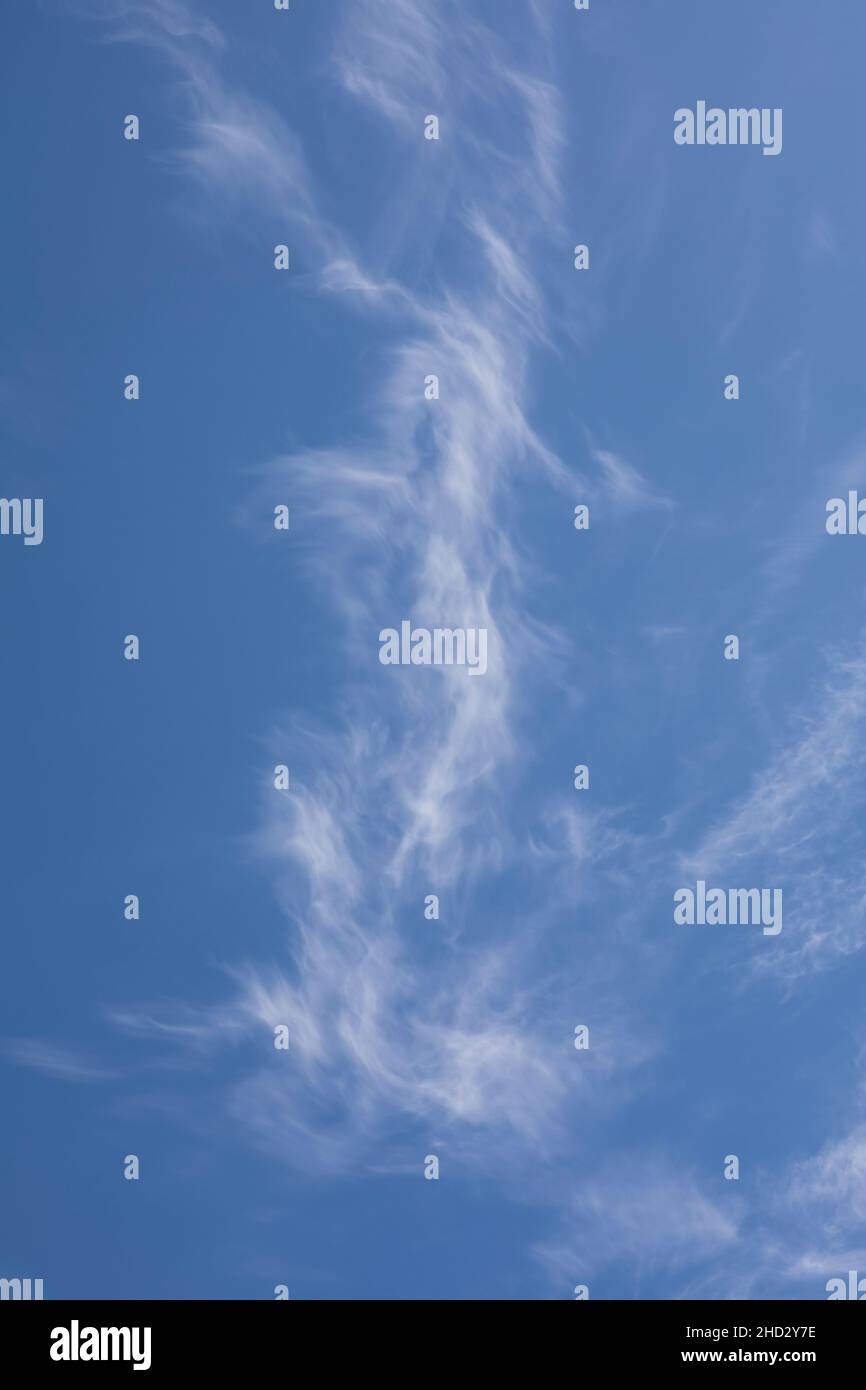 Blue Sky with wispy clouds backgrounds Stock Photo - Alamy
