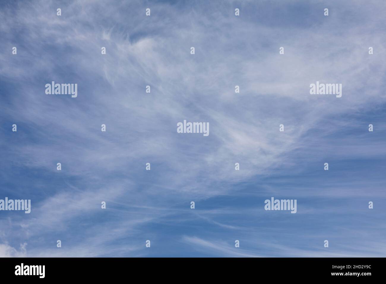 Blue sky with wispy clouds hi-res stock photography and images - Alamy