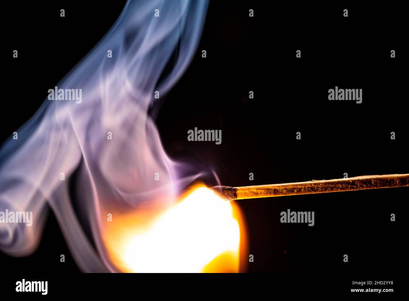 Fire on a match Stock Photo - Alamy