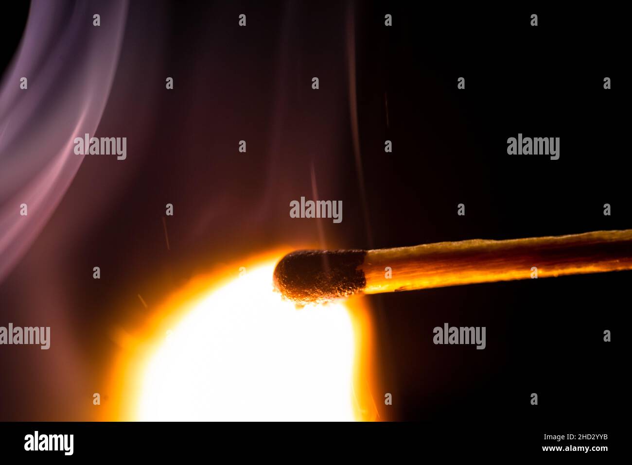 Fire on a match Stock Photo - Alamy