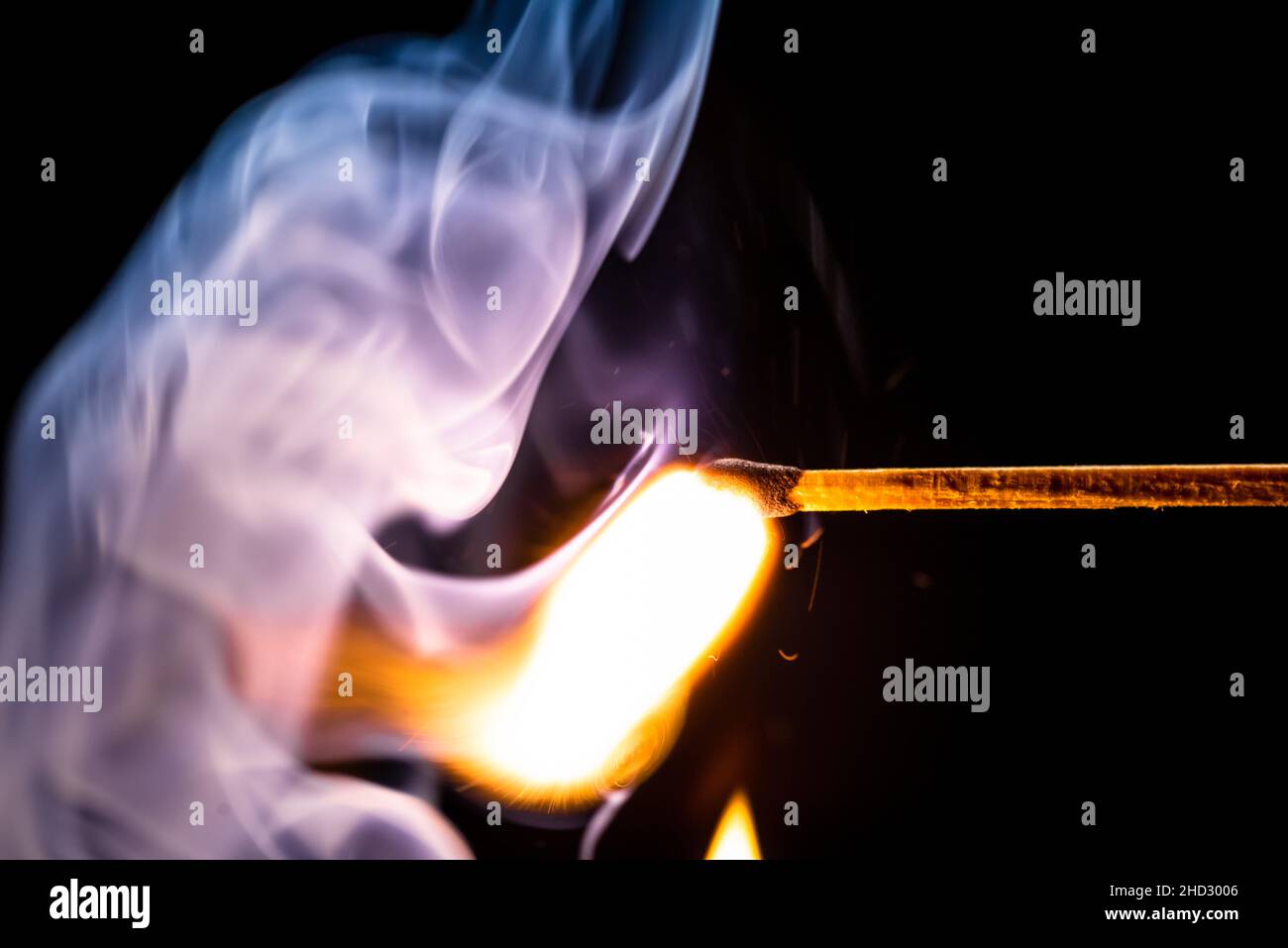 Fire on a match Stock Photo - Alamy